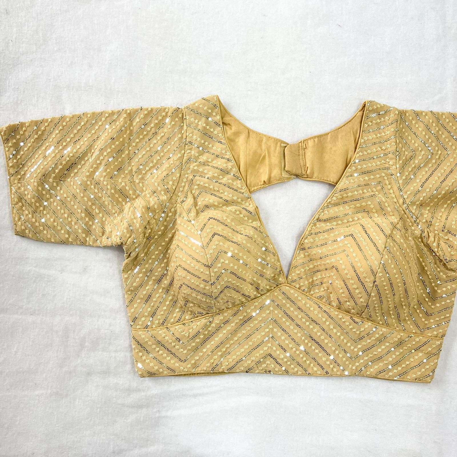 Georgette with Sabyasachi Style Deep Neck Fancy Stich blouse collection